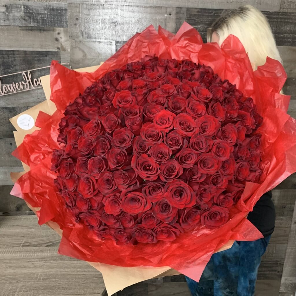 150 Red Roses Hand Bouquet | Same day Flower delivery Lahore